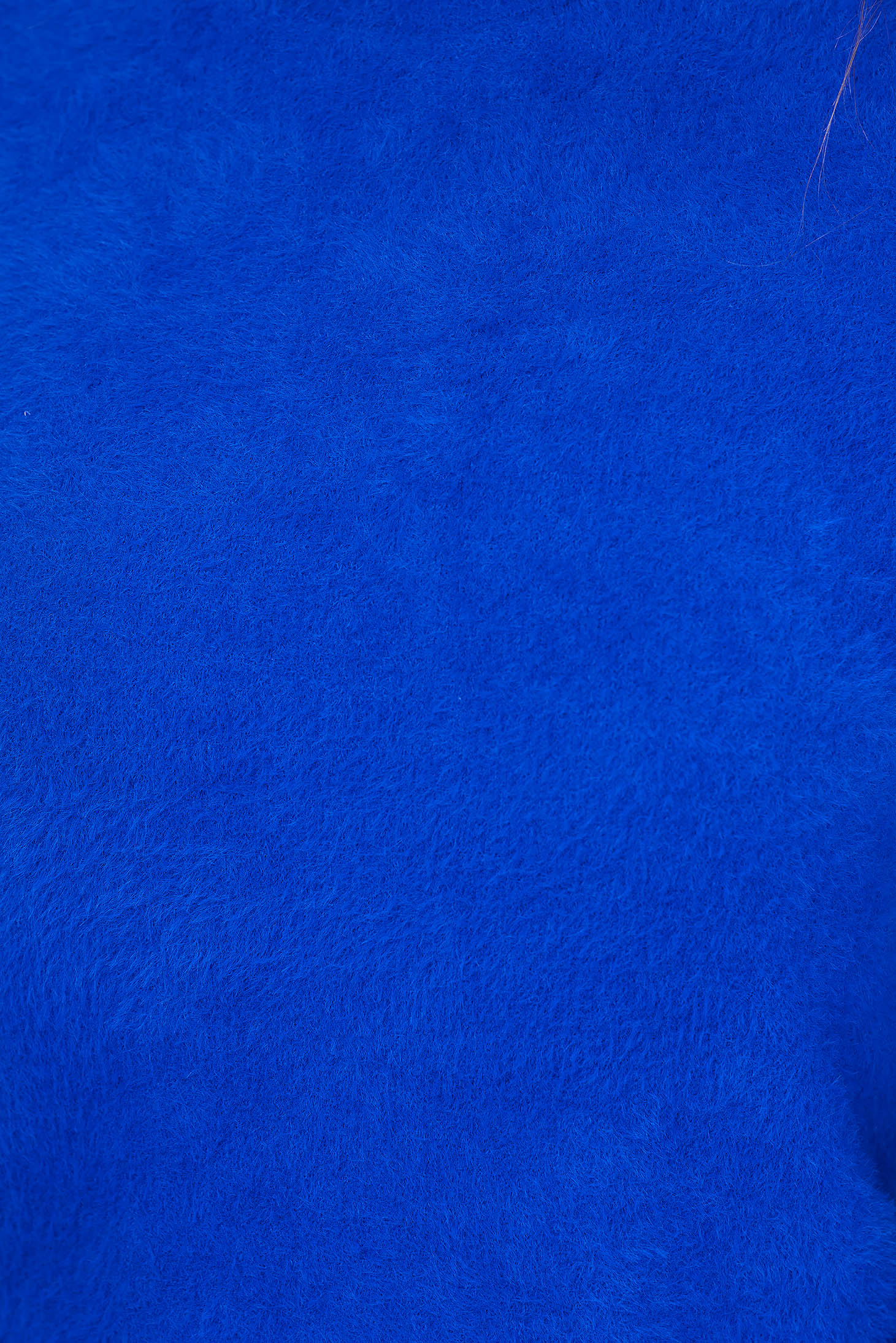 Blue sweater knitted from fluffy fabric loose fit